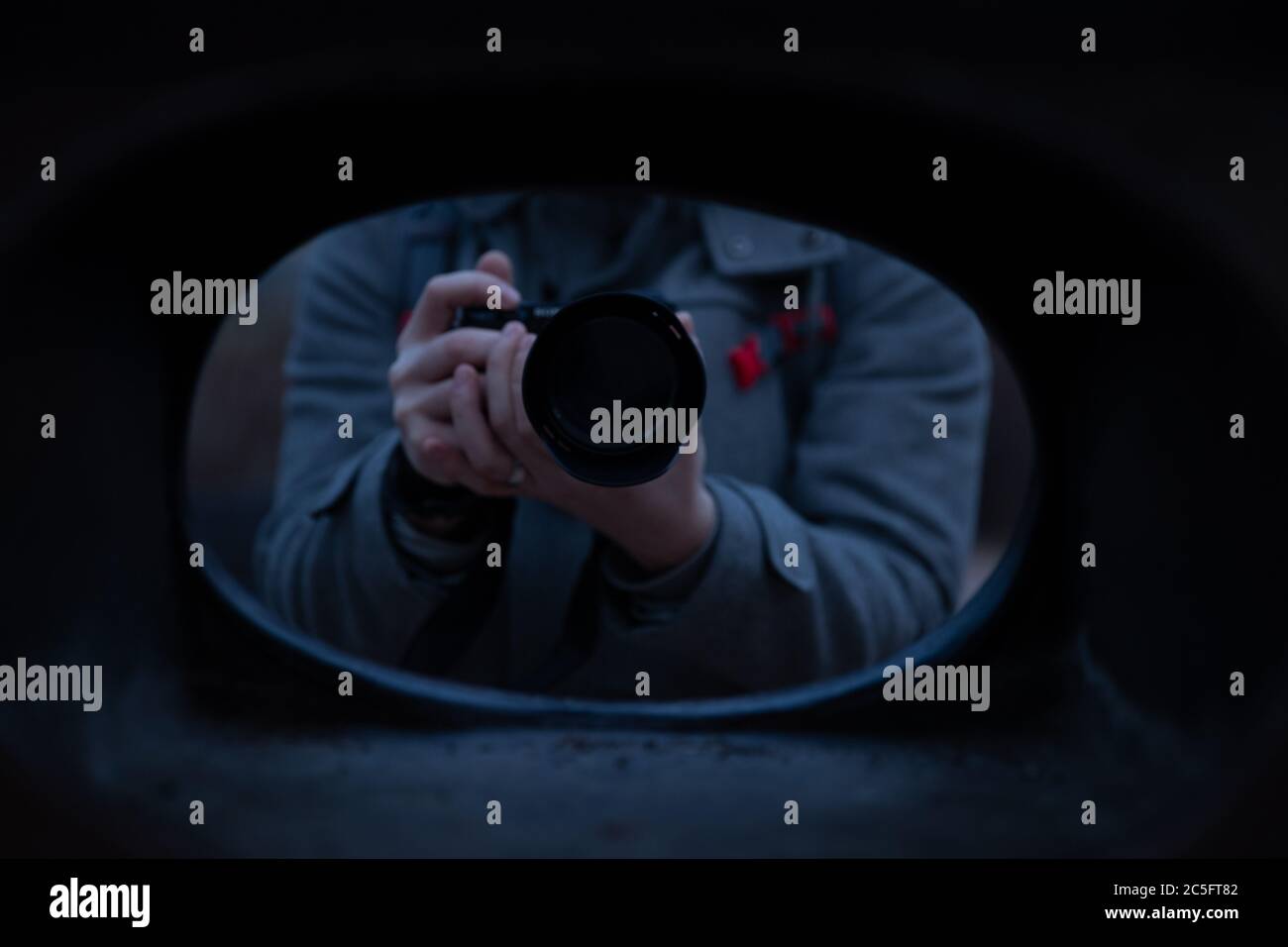 Taking pictures with camera through another camera and lens Stock Photo ...