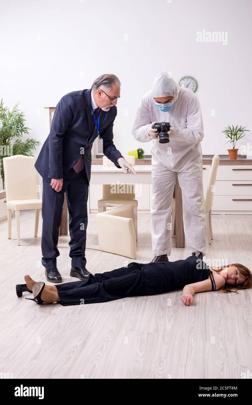 Forensic experts at the crime scene at home Stock Photo - Alamy