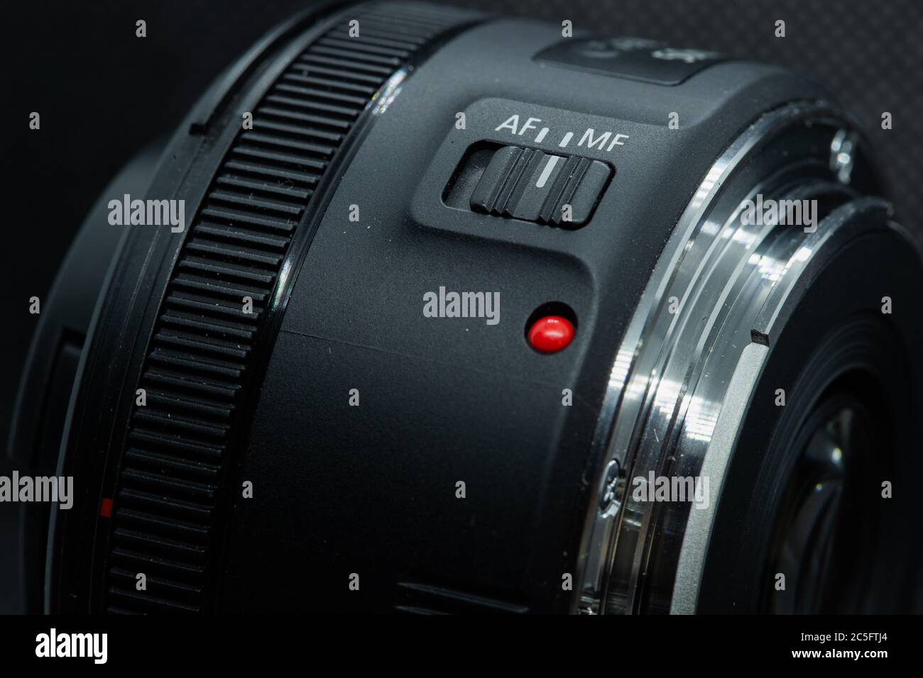 Macro closeup photo of lens to dslr camera on dark background view of ...