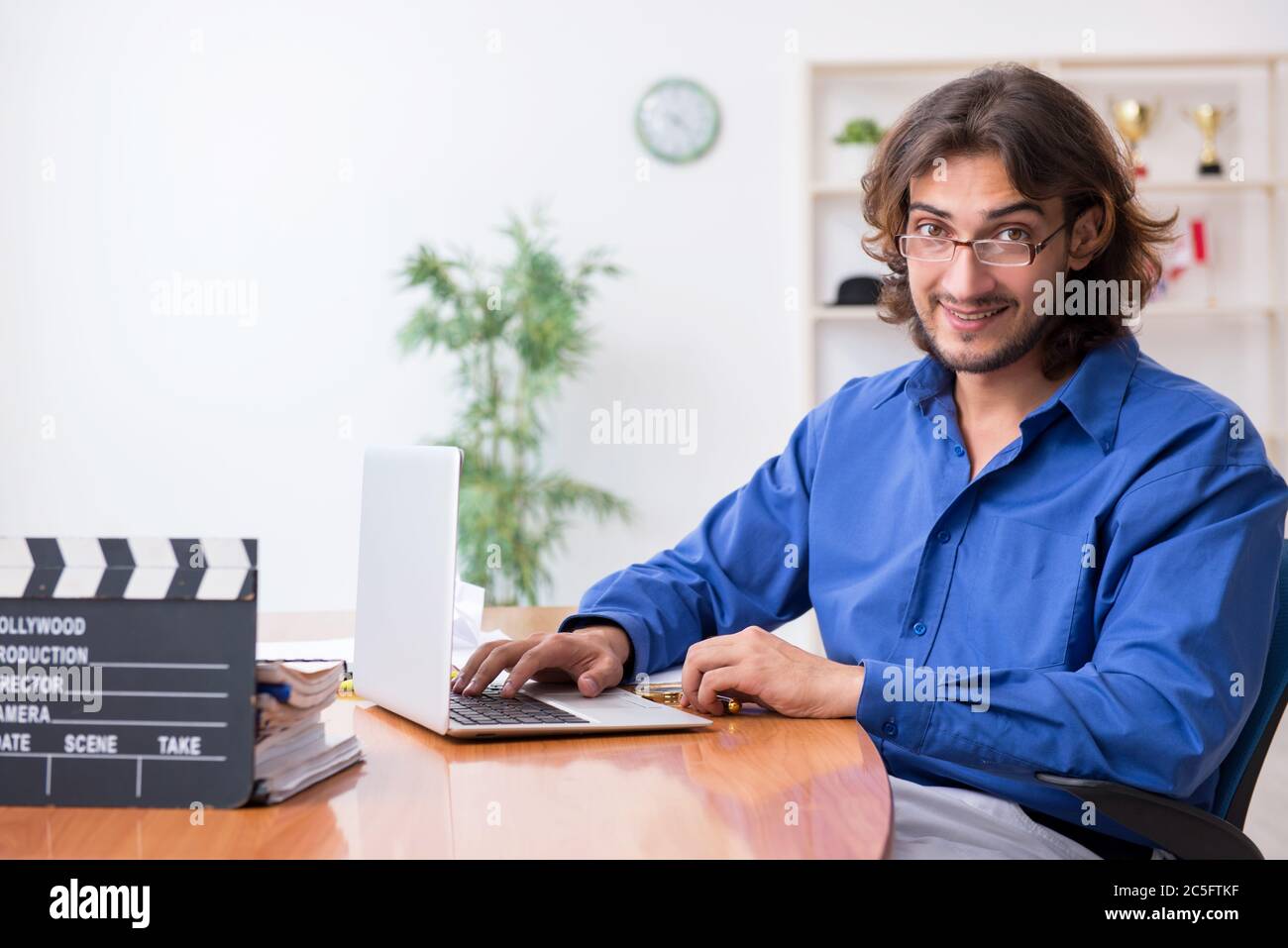 Movie director working in studio Stock Photo - Alamy