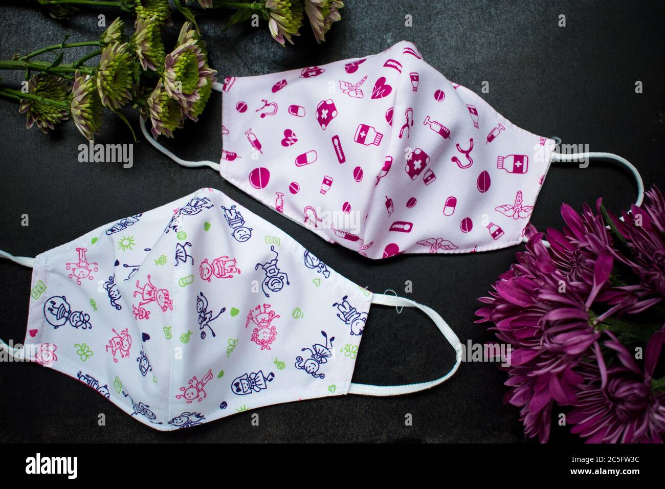 Kids pink medical face masks Stock Photo - Alamy