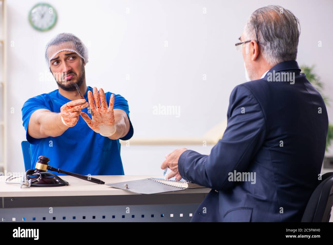 Doctor in courthouse meeting with advocate Stock Photo - Alamy