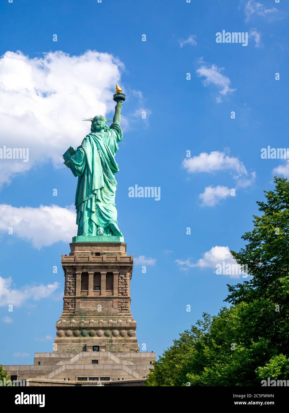 back view of Statue of Liberty in America on a hot summer day Stock ...