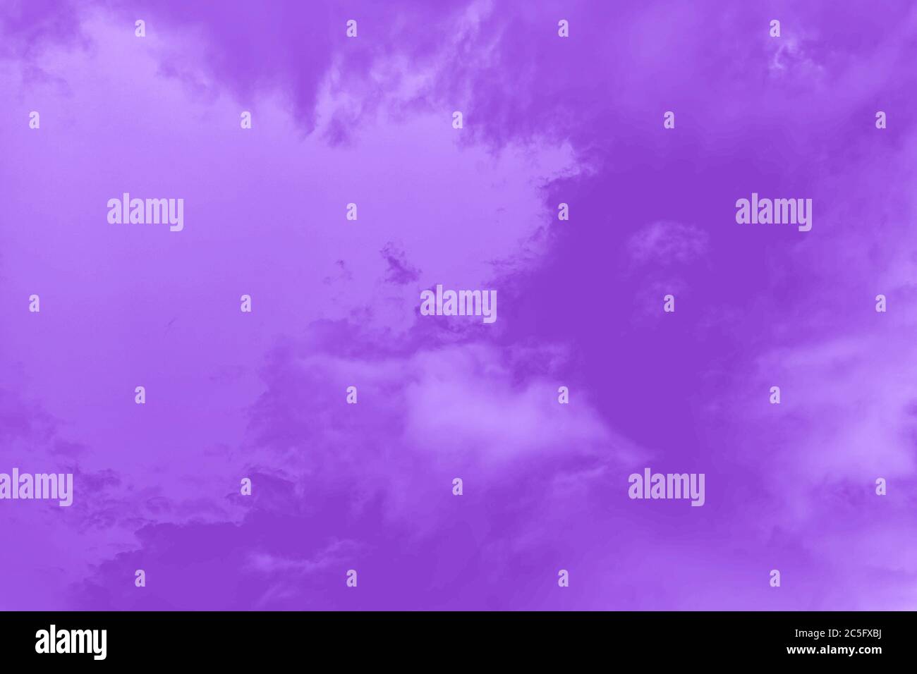 Purple fluffy clouds in the sky. Violet sky background Stock Photo - Alamy