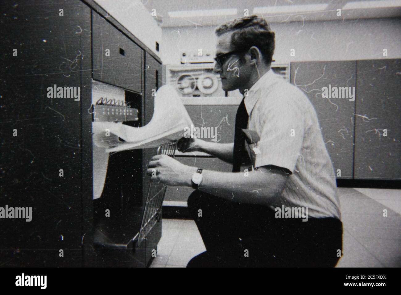 Fine 70s vintage black and white lifestyle photography of an employee ...