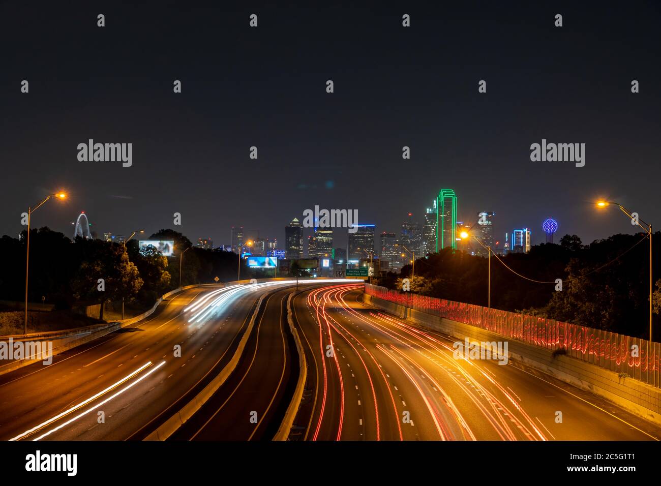 Long Exposure View of Downtown Dallas With Wide Highway and Traffic ...