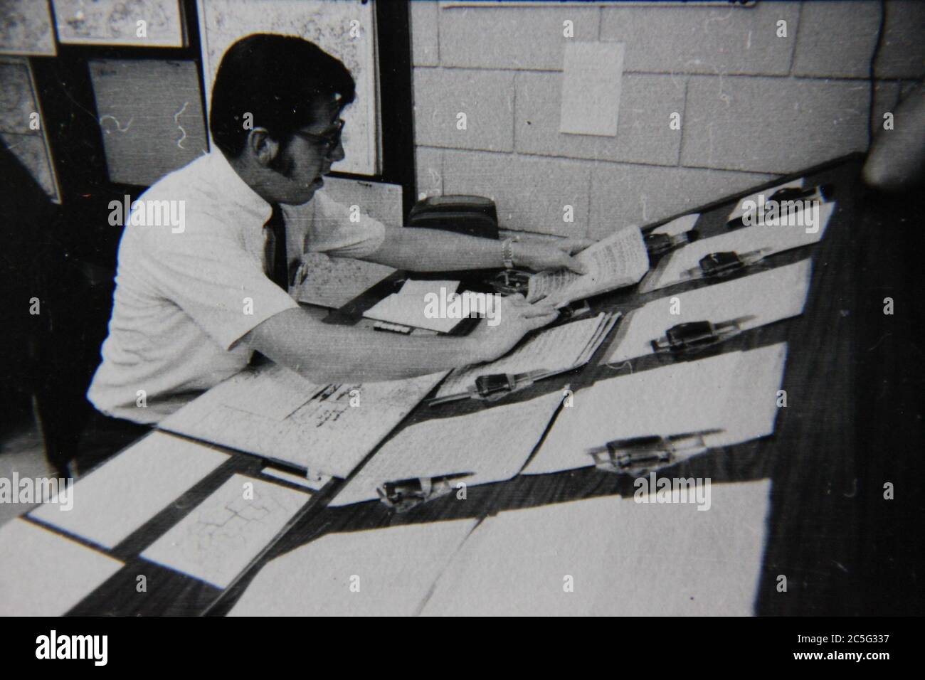 Fine 70s vintage black and white lifestyle photography of an engineer ...