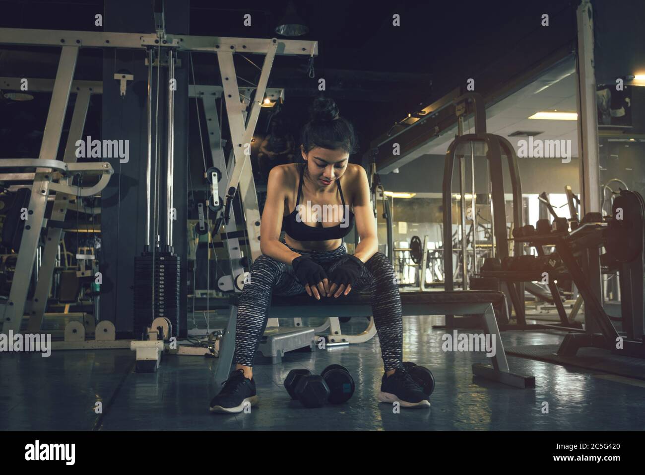 Fitness gym with people in health club Stock Photo - Alamy