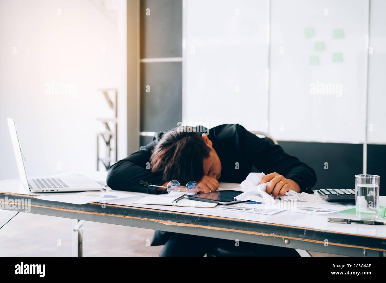 Employees are feeling tired while working Stock Photo - Alamy