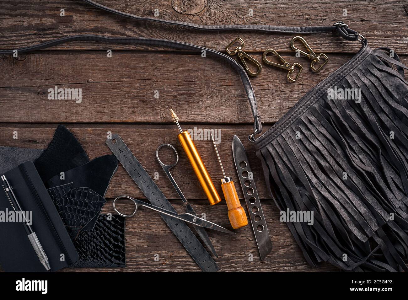 Leather products. Work place craftsman in a workshop. Top view Stock ...