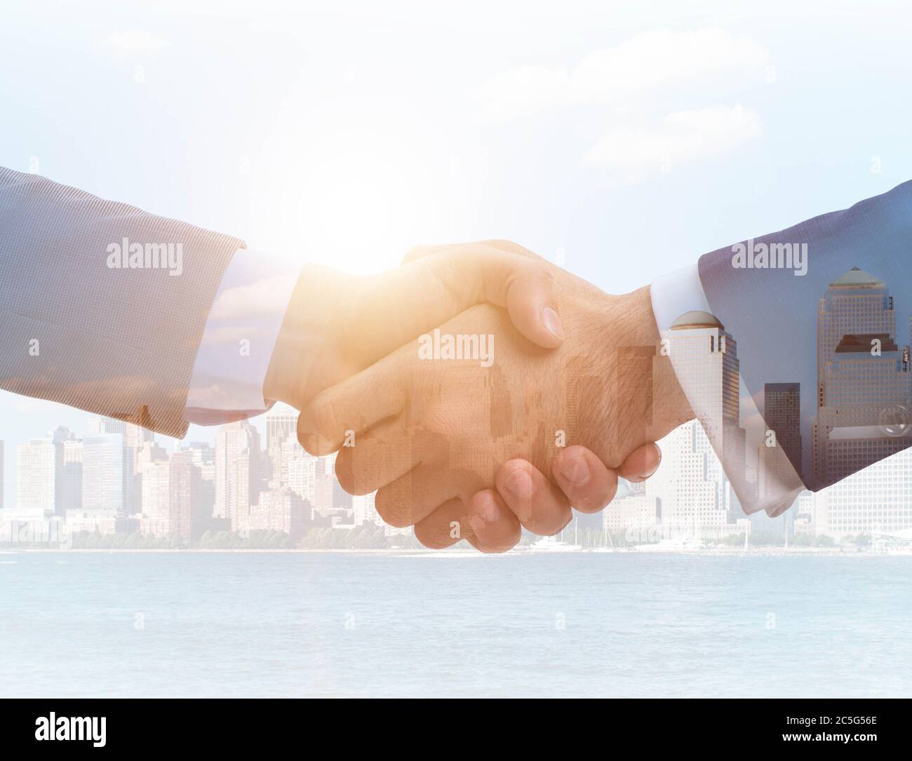 The concept of cooperation with handshake Stock Photo - Alamy