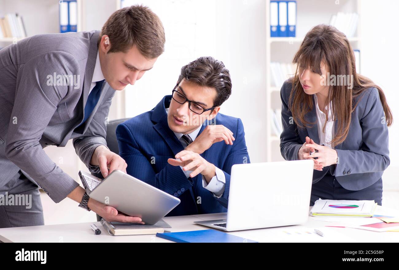 The business meeting with employees in the office Stock Photo - Alamy