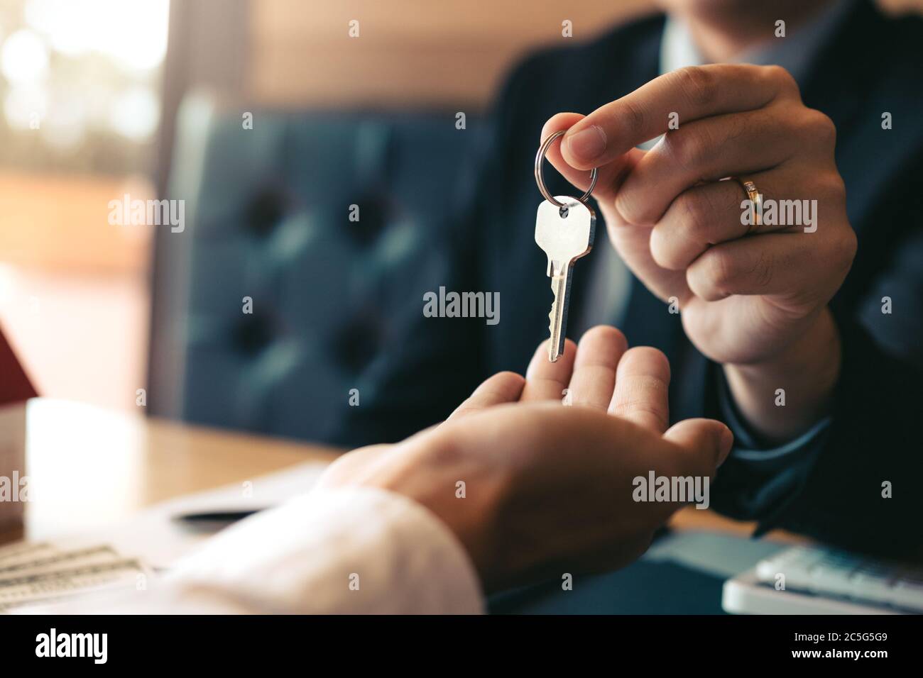 Handing out business client hi-res stock photography and images - Alamy