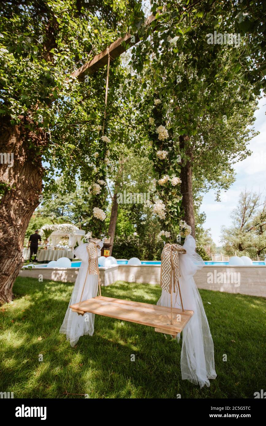 Flower decorated swing hi-res stock photography and images - Alamy