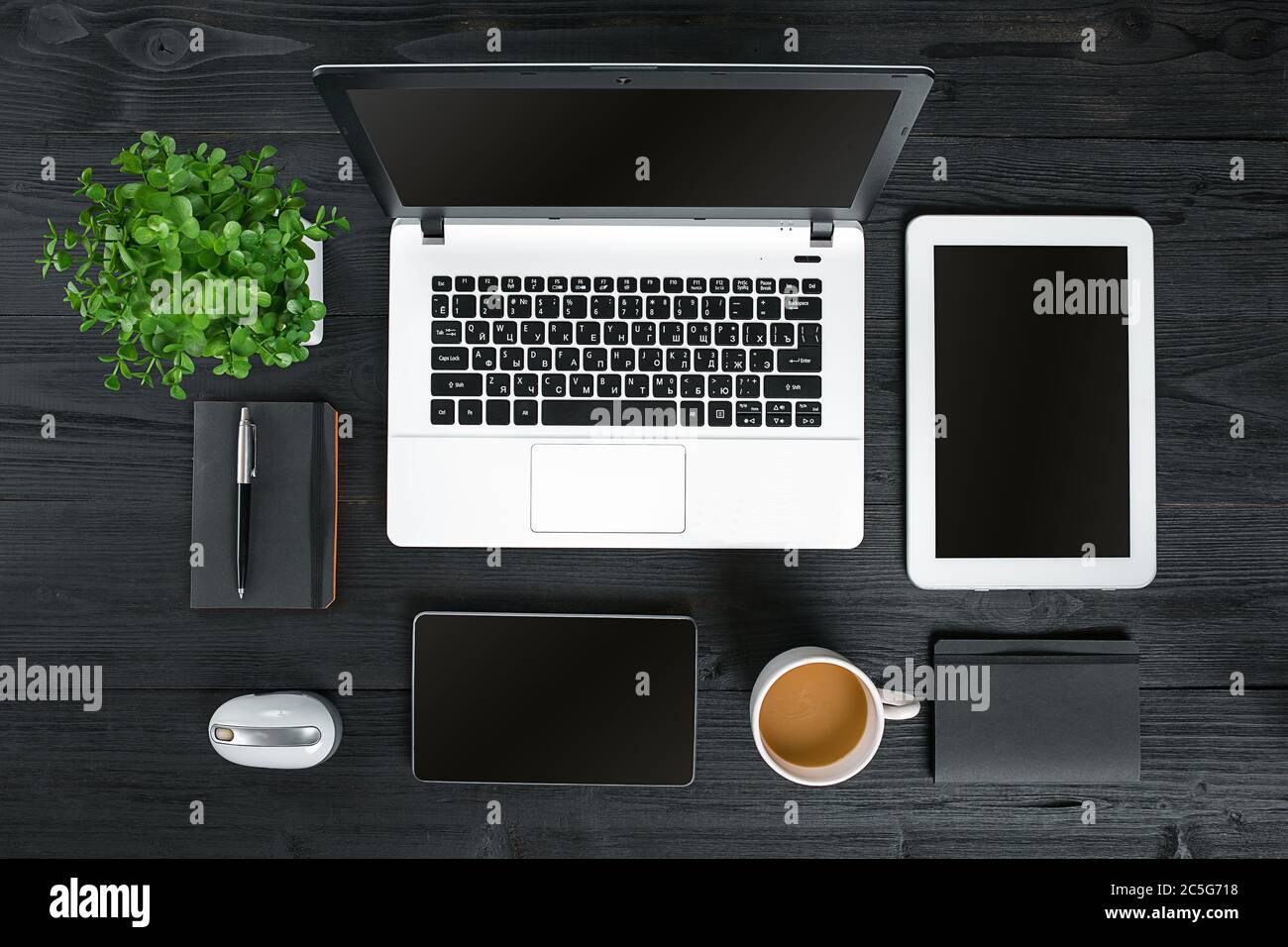 Directly above view of human hands typing on laptop Stock Photo - Alamy