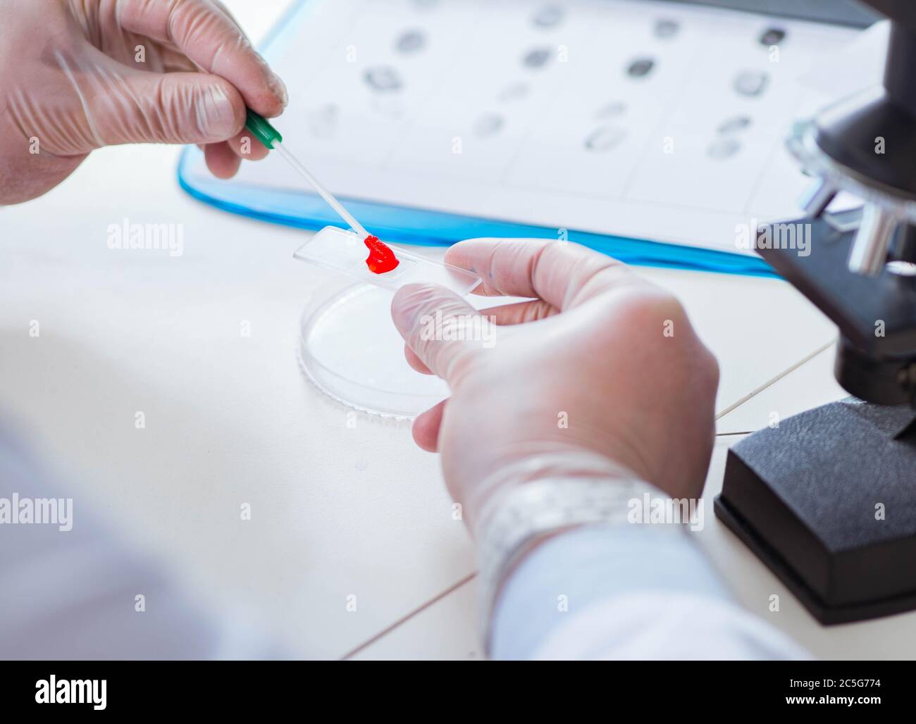 The drug synthesis lab experimentnig with pills Stock Photo - Alamy