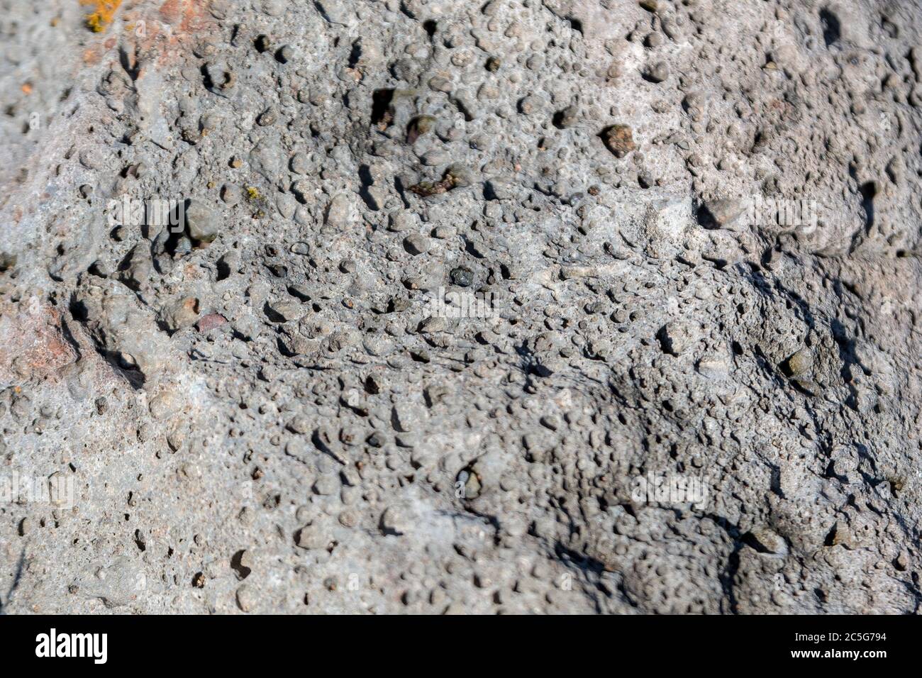 Closeup view of the surface of a dark grey meteorite Stock Photo - Alamy