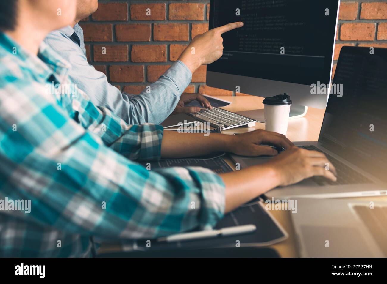 Developing programming and coding technologies working in a software engineers developing ...