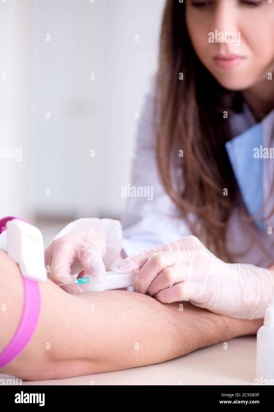 The patient during blood test sampling procedure taken for analysis ...