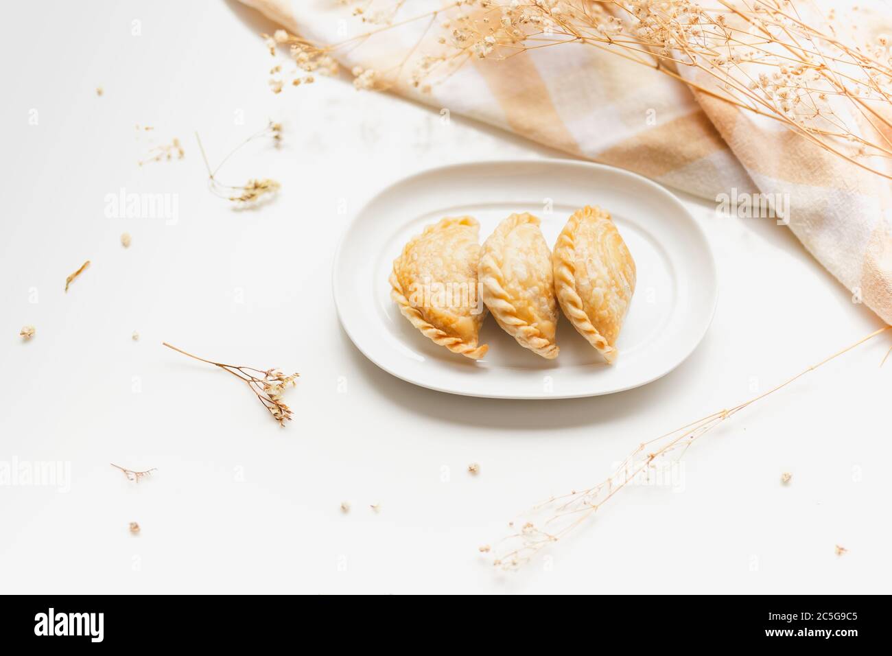 Thai traditional pastry curry puffs on white background Stock Photo - Alamy