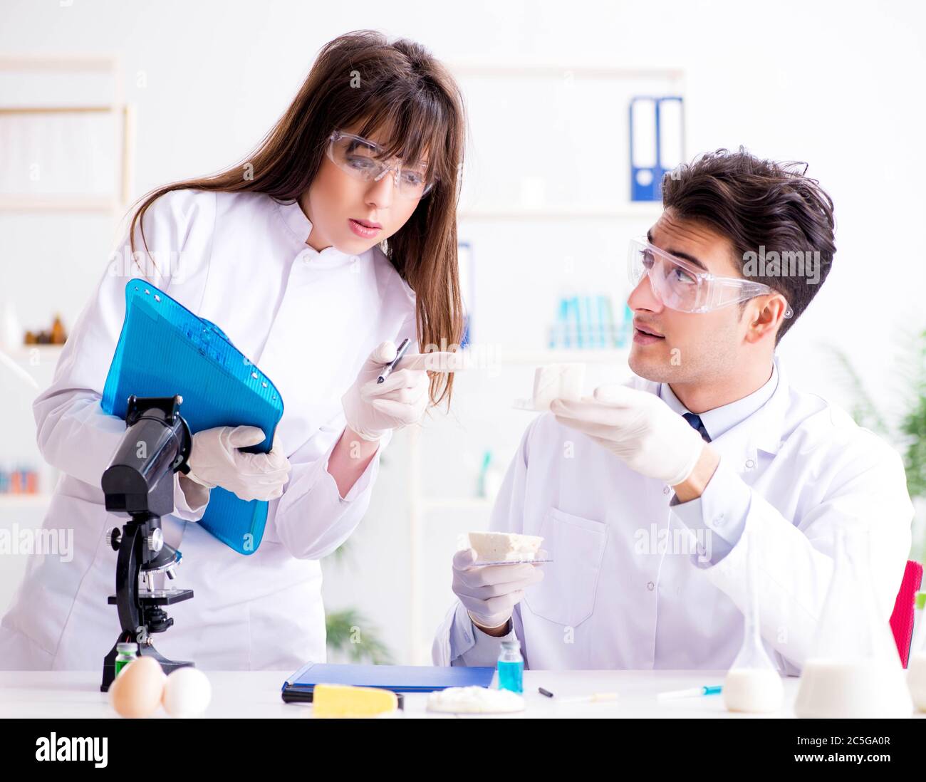 Doctor writing organic products hi-res stock photography and images - Alamy
