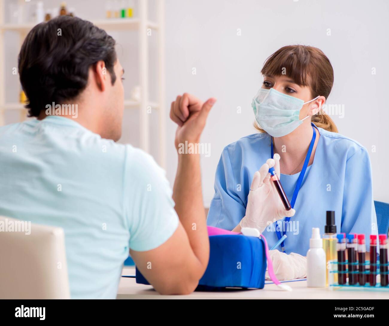 The young patient during blood test sampling procedure Stock Photo - Alamy