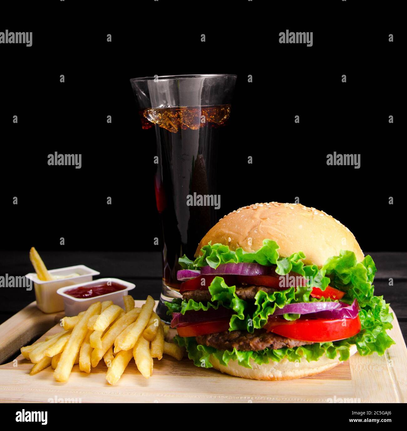 The burger served in bun in nutrition fast food concept Stock Photo - Alamy