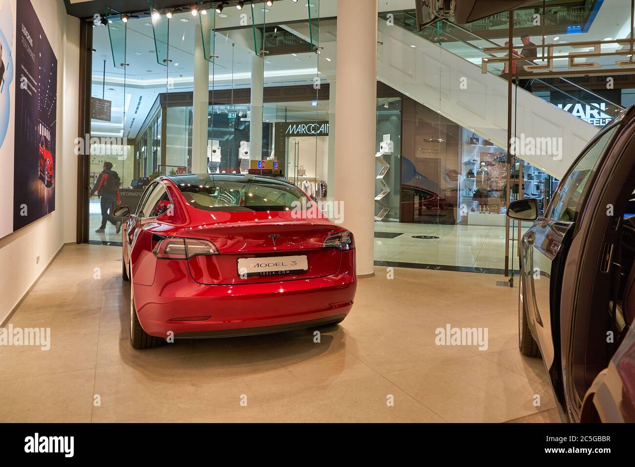 BERLIN, GERMANY - CIRCA SEPTEMBER, 2019: red Model 3 on display at ...