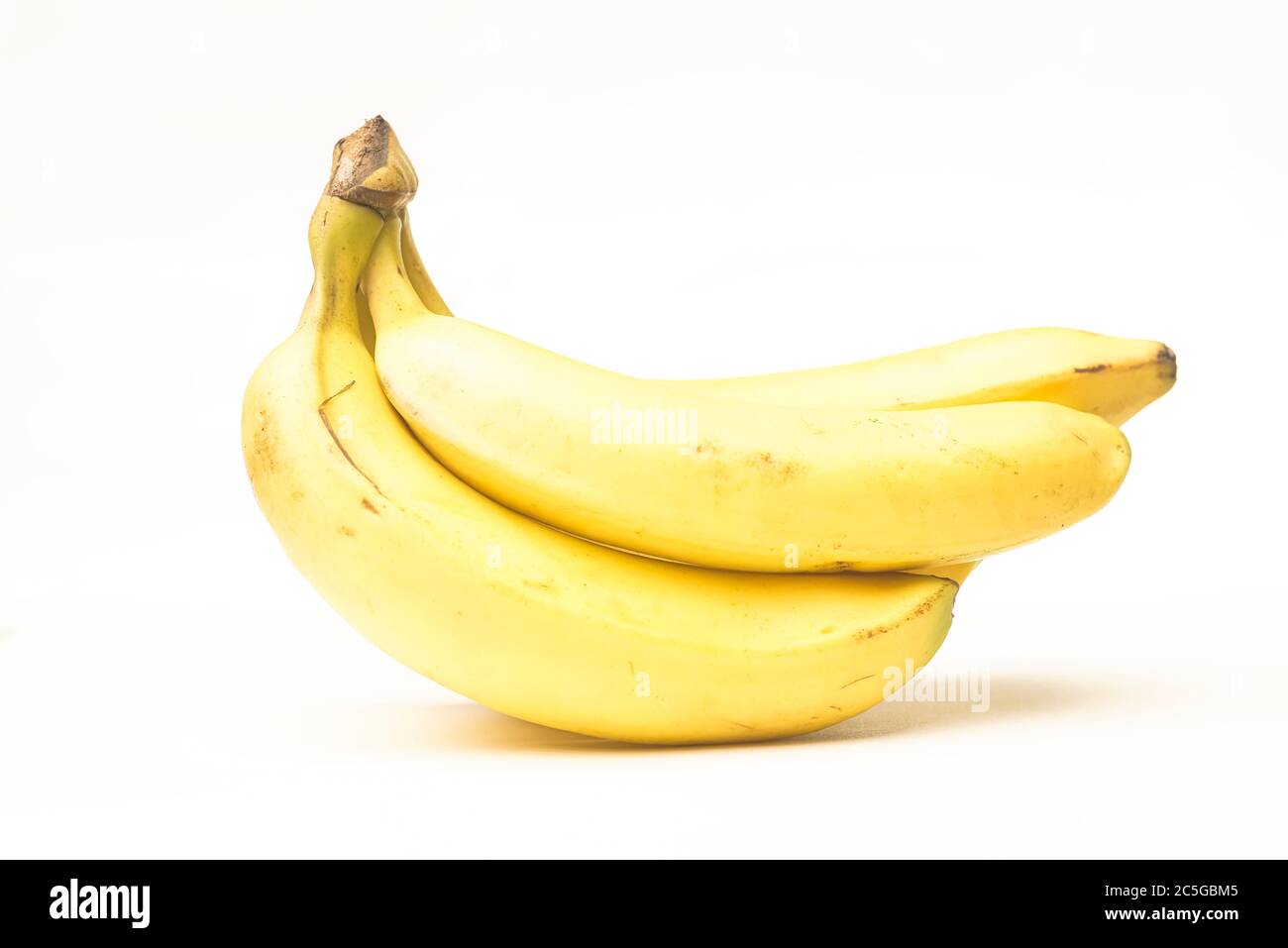 Yellow fresh banana isolated against white, selective focusing Stock ...
