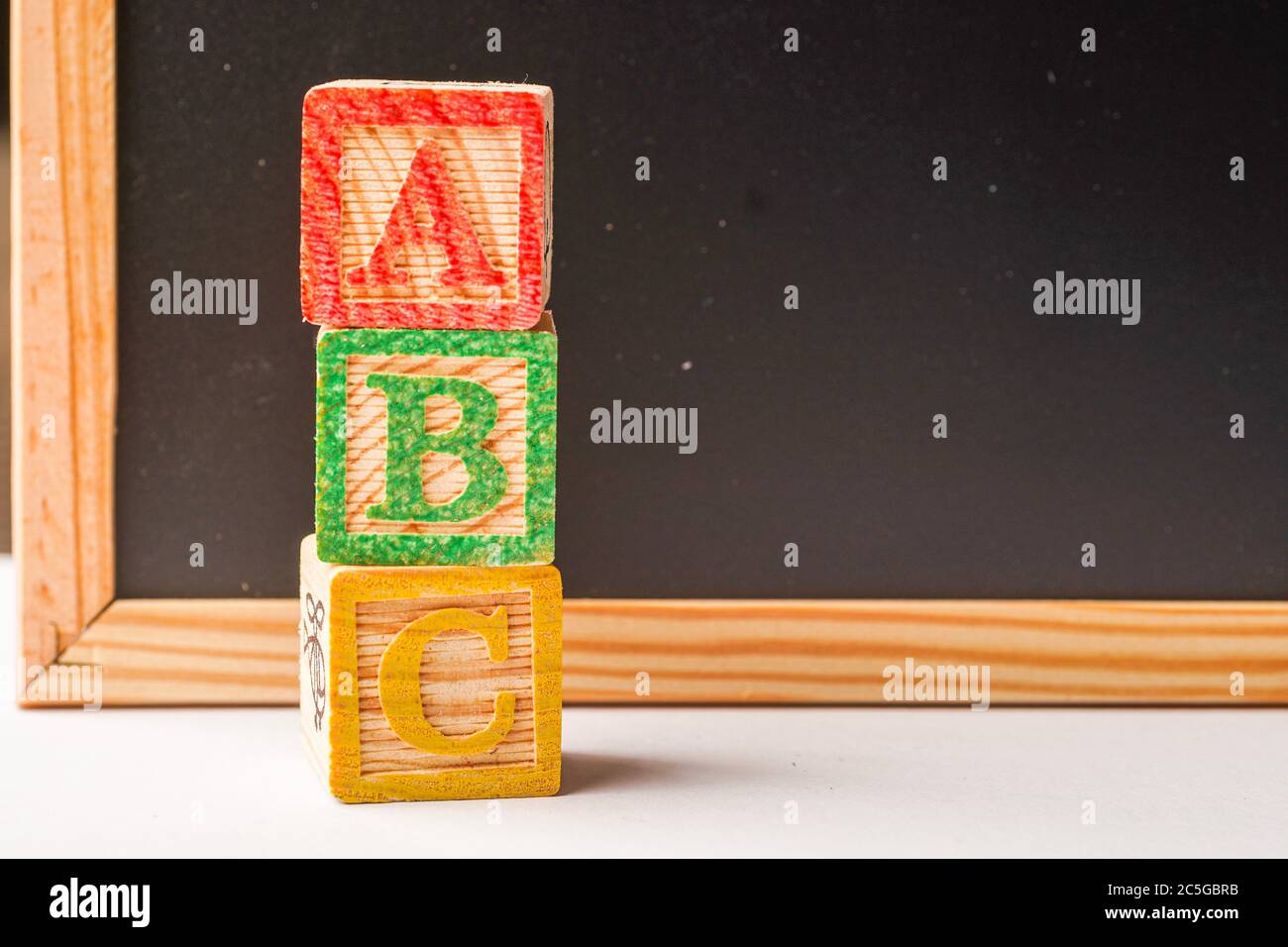 ABC blocks arranged in stack, education and kids background Stock Photo ...