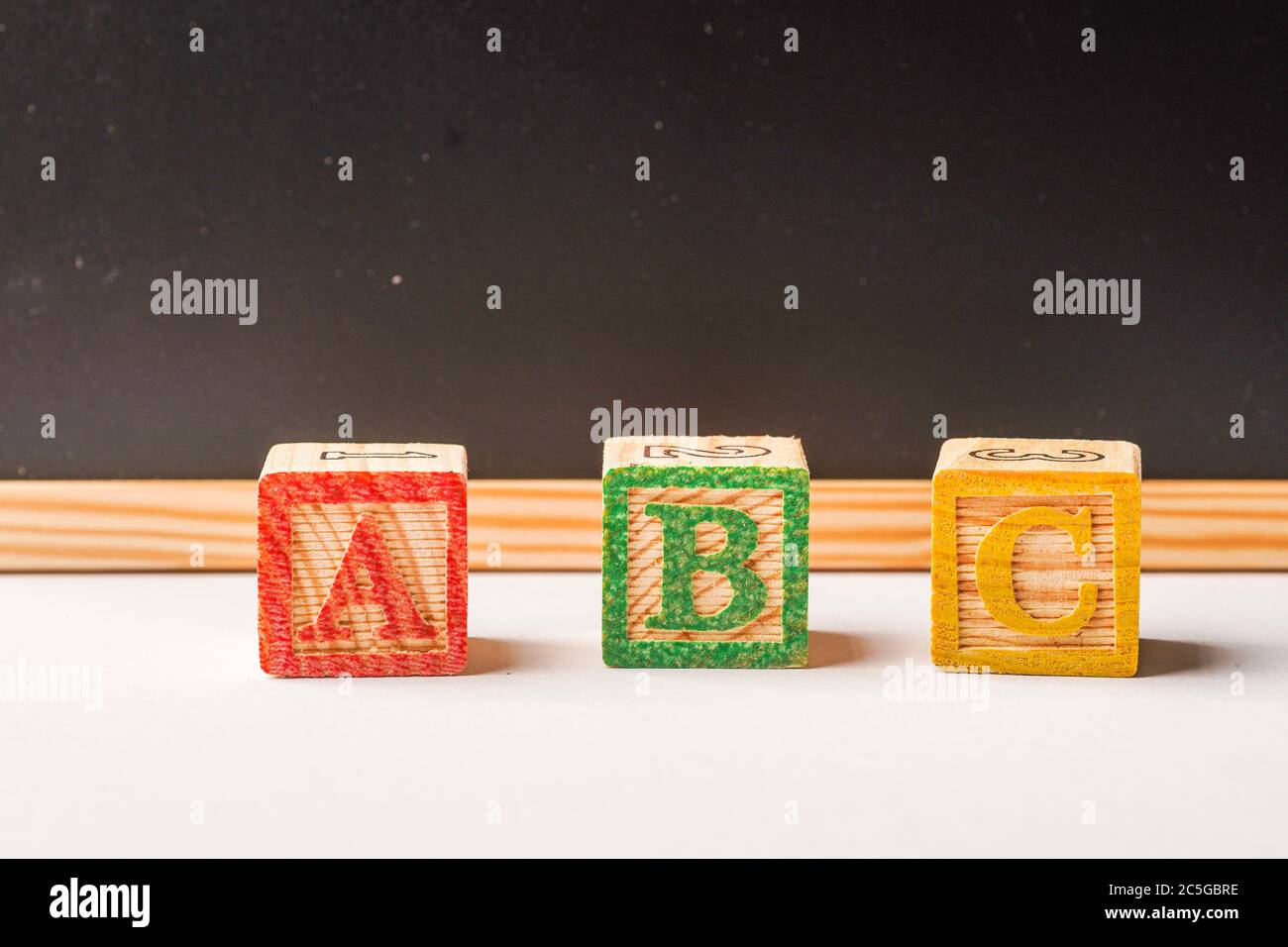 ABC blocks arranged in stack, education and kids background Stock Photo ...