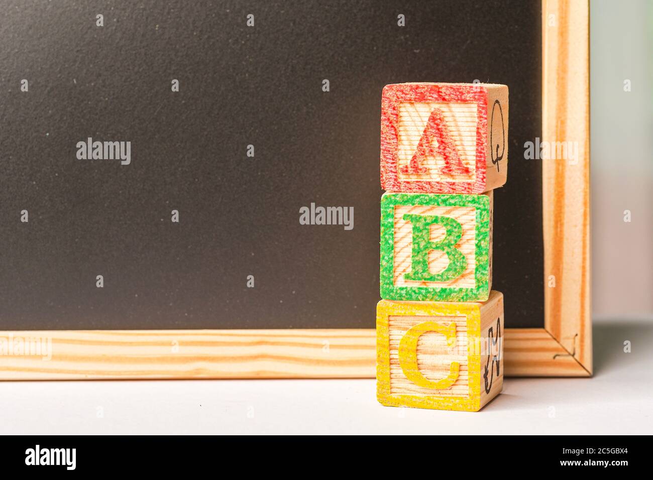 ABC blocks arranged in stack, education and kids background Stock Photo ...