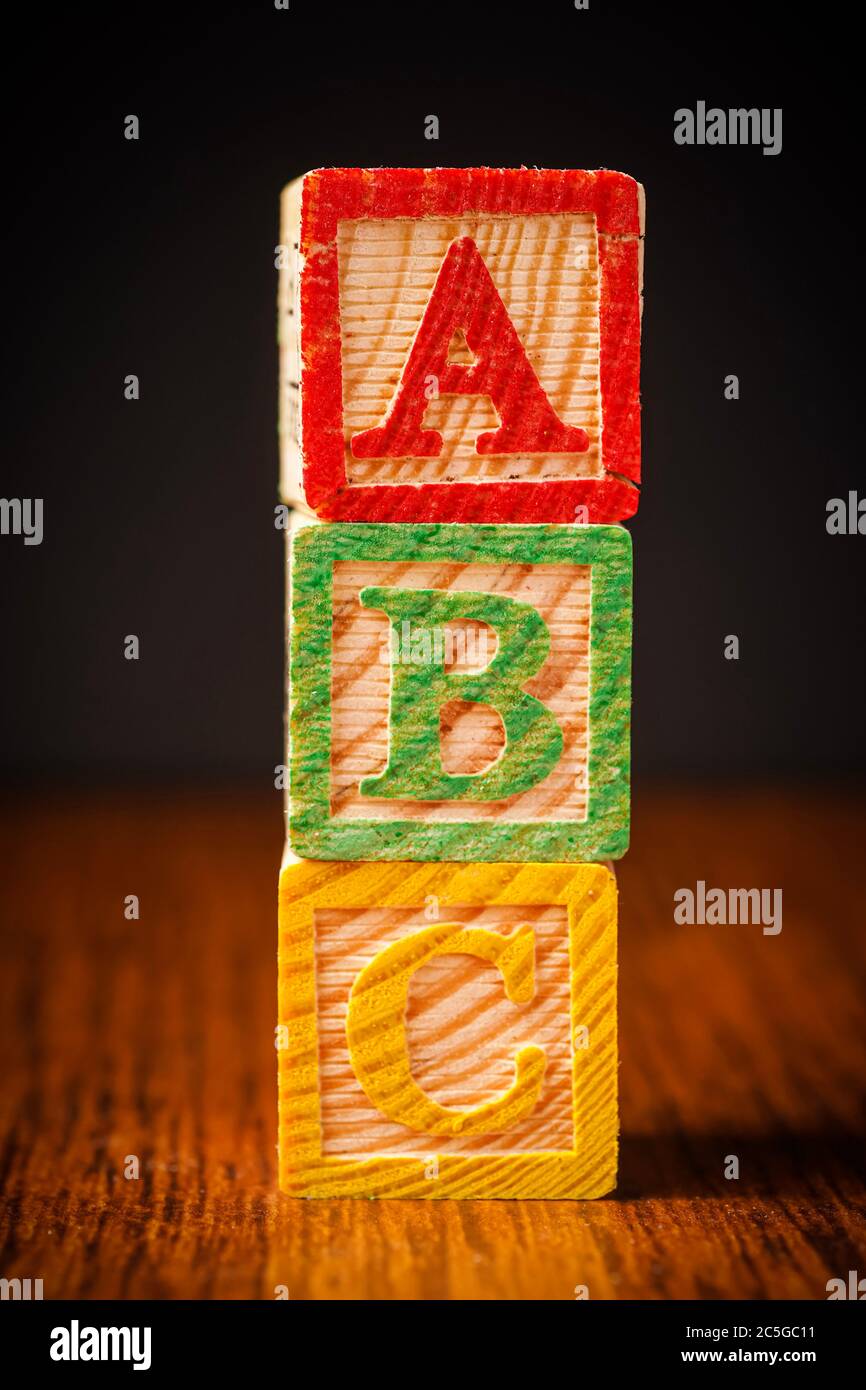 ABC blocks arranged in stack, education and kids background Stock Photo ...