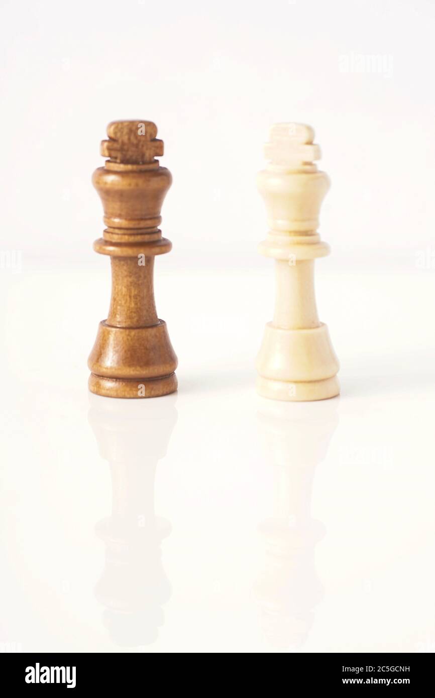wooden chess pieces isolated against white Stock Photo - Alamy
