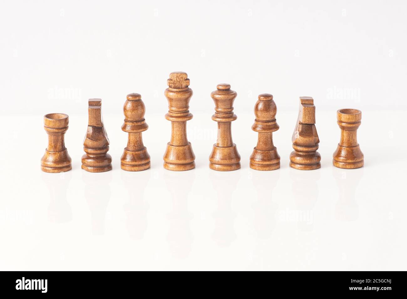 wooden chess pieces isolated against white Stock Photo - Alamy