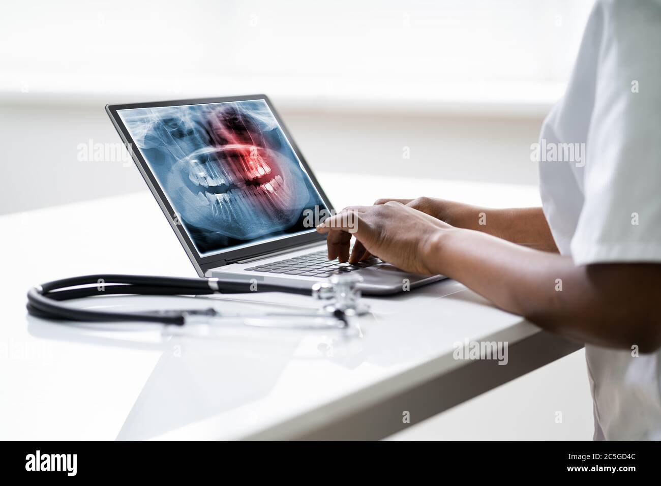 Dentist Doctor Looking At Teeth Xray Using Computer Software Stock ...