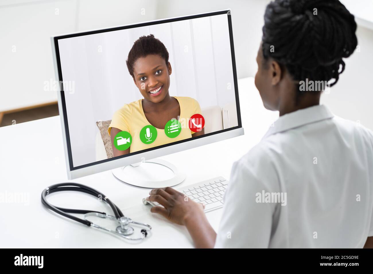 African Doctor In Video Conference Call Talking With Patient Stock ...