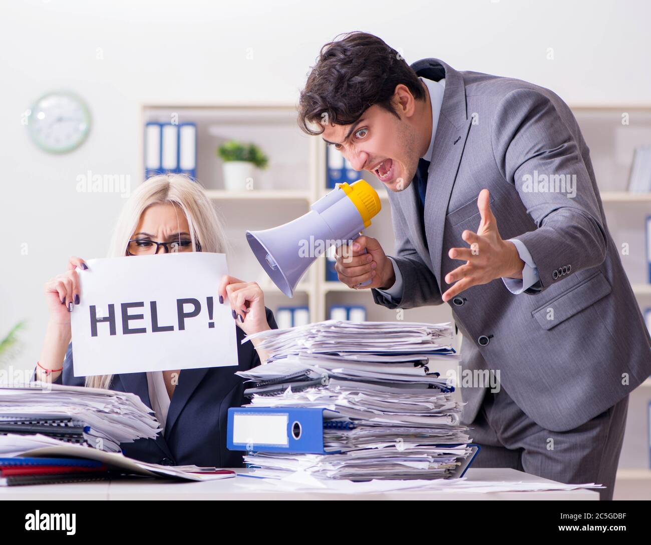 The angry boss yelling at his assistant secretary Stock Photo - Alamy