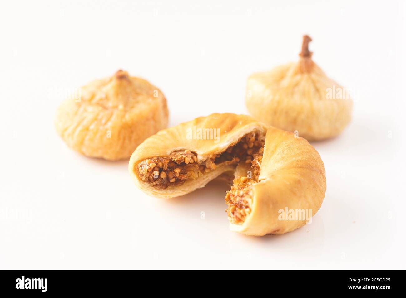 Dried figs isolated against white Stock Photo - Alamy