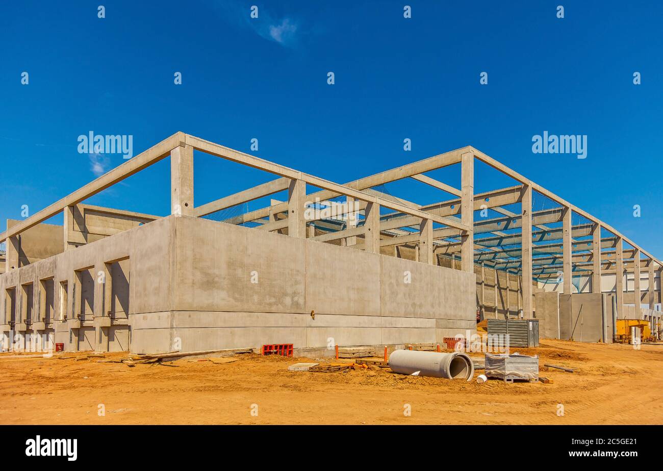 Construction site with precast concrete columns, beams and walls Stock ...