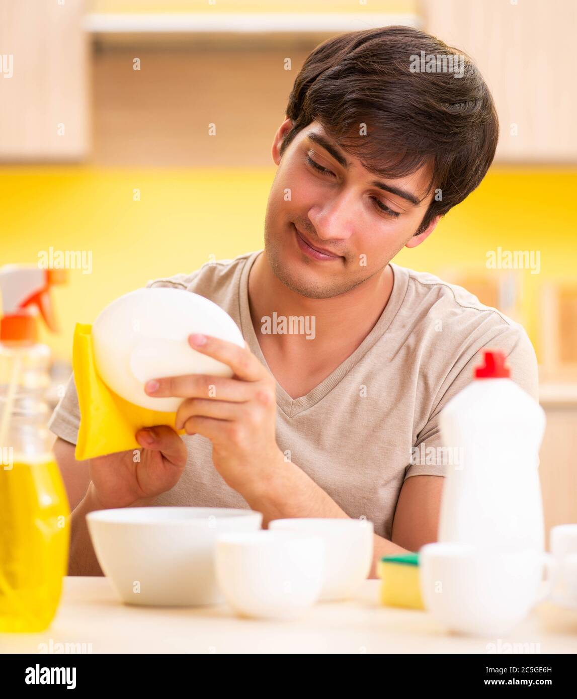 The man washing dishes at home Stock Photo - Alamy