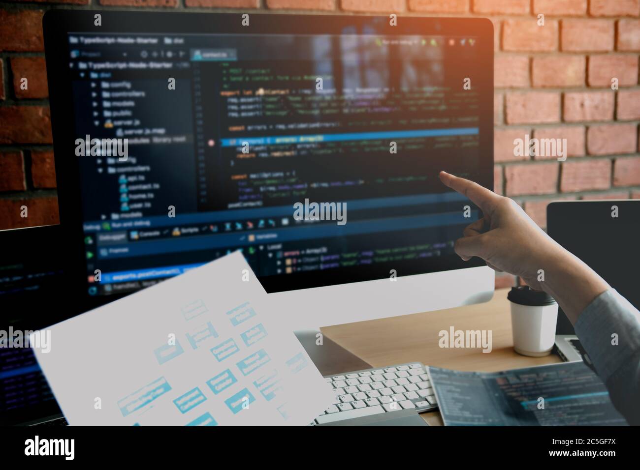 Man hands pointing coding html and programming develop on screen ...