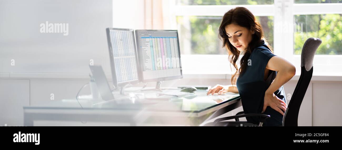 Back Pain At Computer. Bad Posture Stress Stock Photo - Alamy