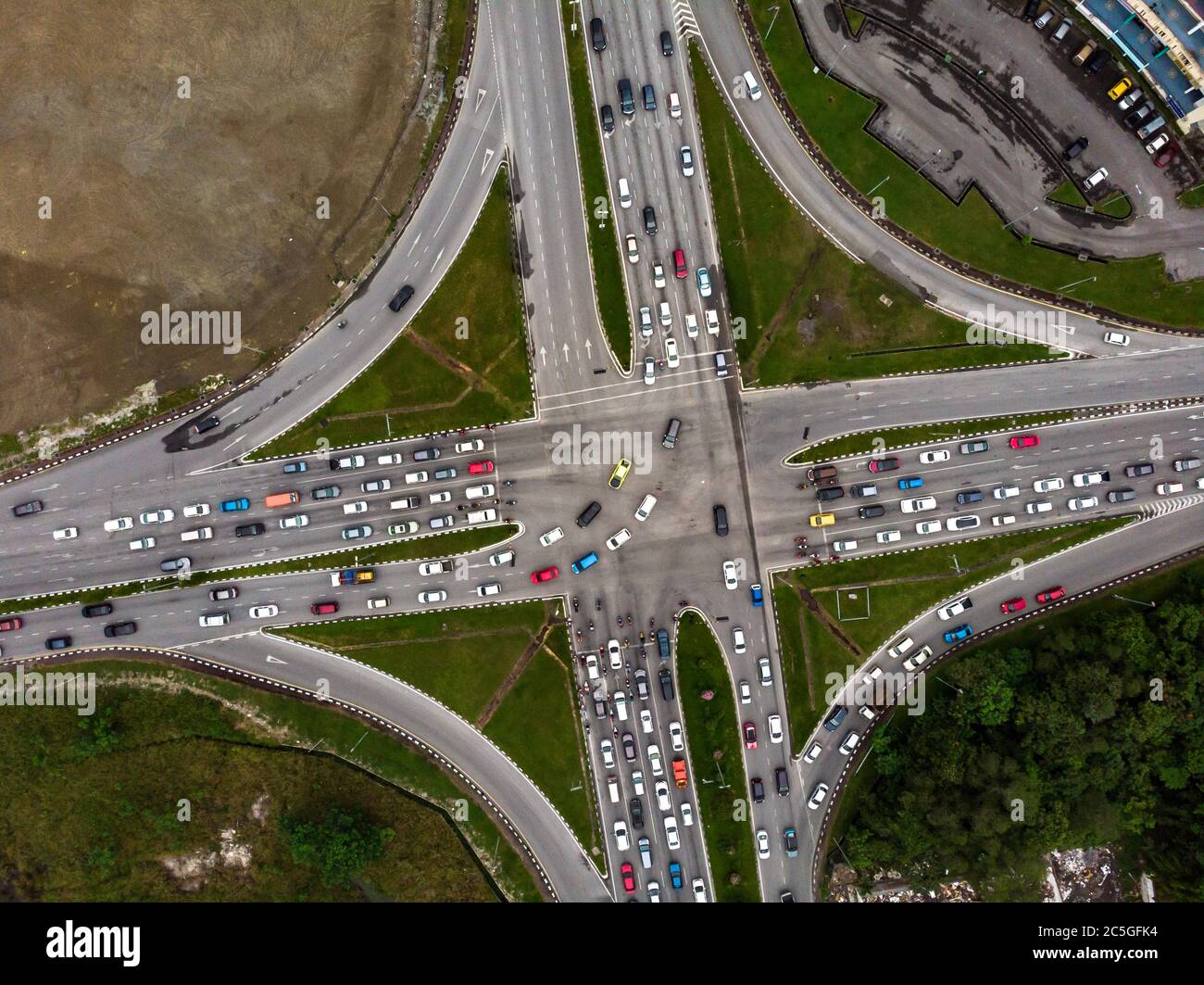 Top down view of road intersection with crowded vehicles Stock Photo ...