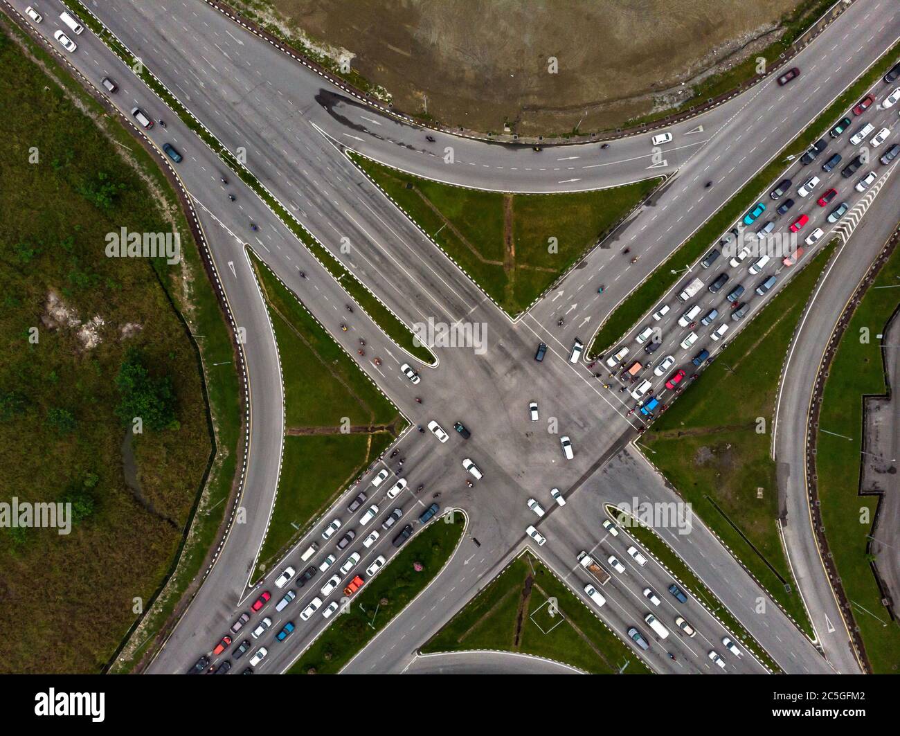 Top down view of road intersection with crowded vehicles Stock Photo ...