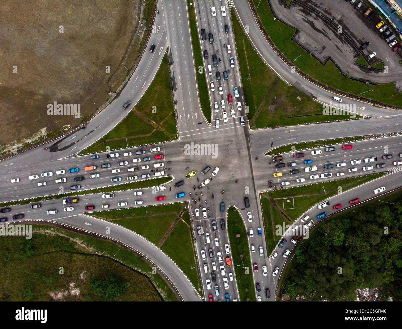 Top down view of road intersection with crowded vehicles Stock Photo ...