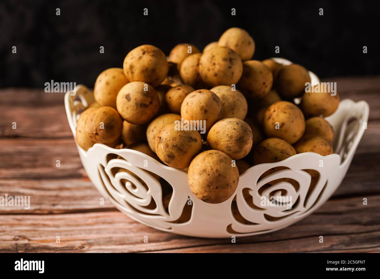 Lansium parasiticum, commonly known in English as langsat or lanzones ...