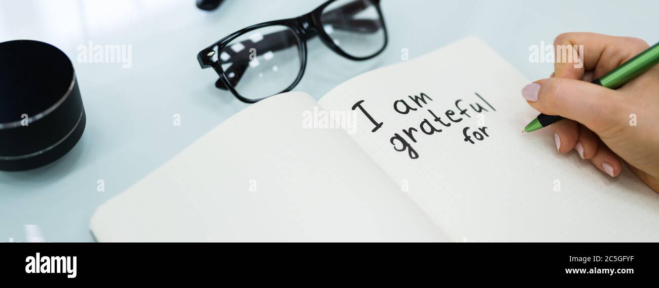 Gratitude Journal Concept. Writing I Am Grateful In Journal Stock Photo ...