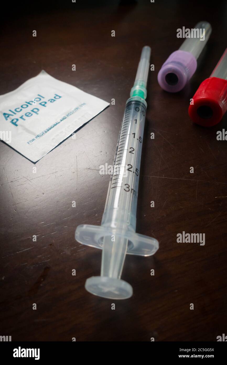 blood taking kit, empty syringe with needle, blood collection tube and ...