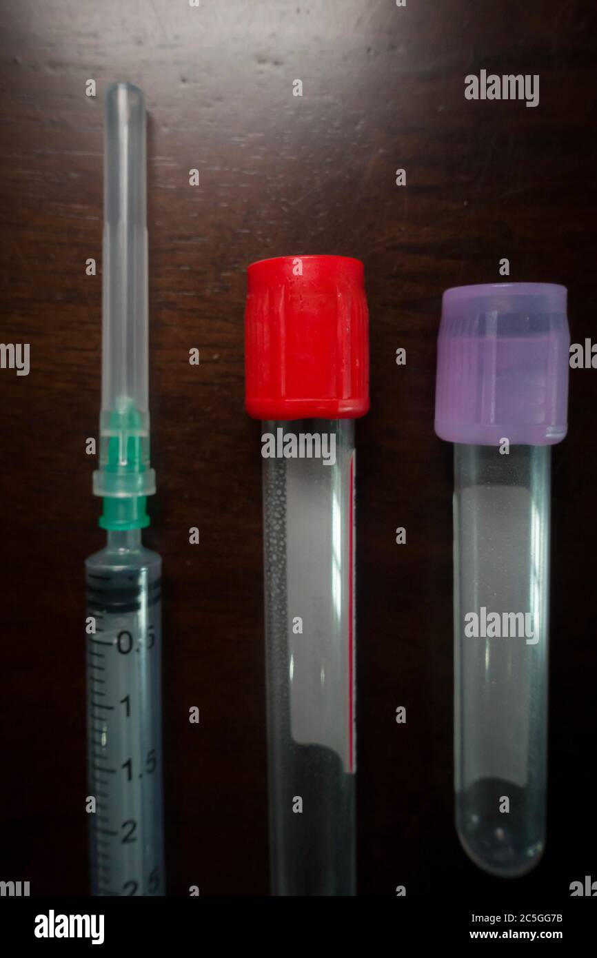 blood taking kit, empty syringe with needle, blood collection tube and ...